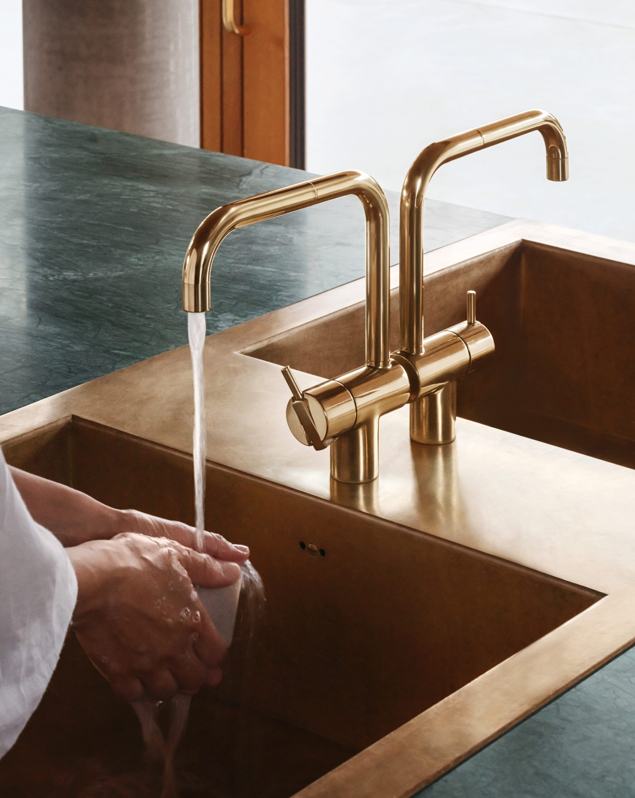 Small Kitchen Faucet Is Minimalist in Nature - Retrofit Home
